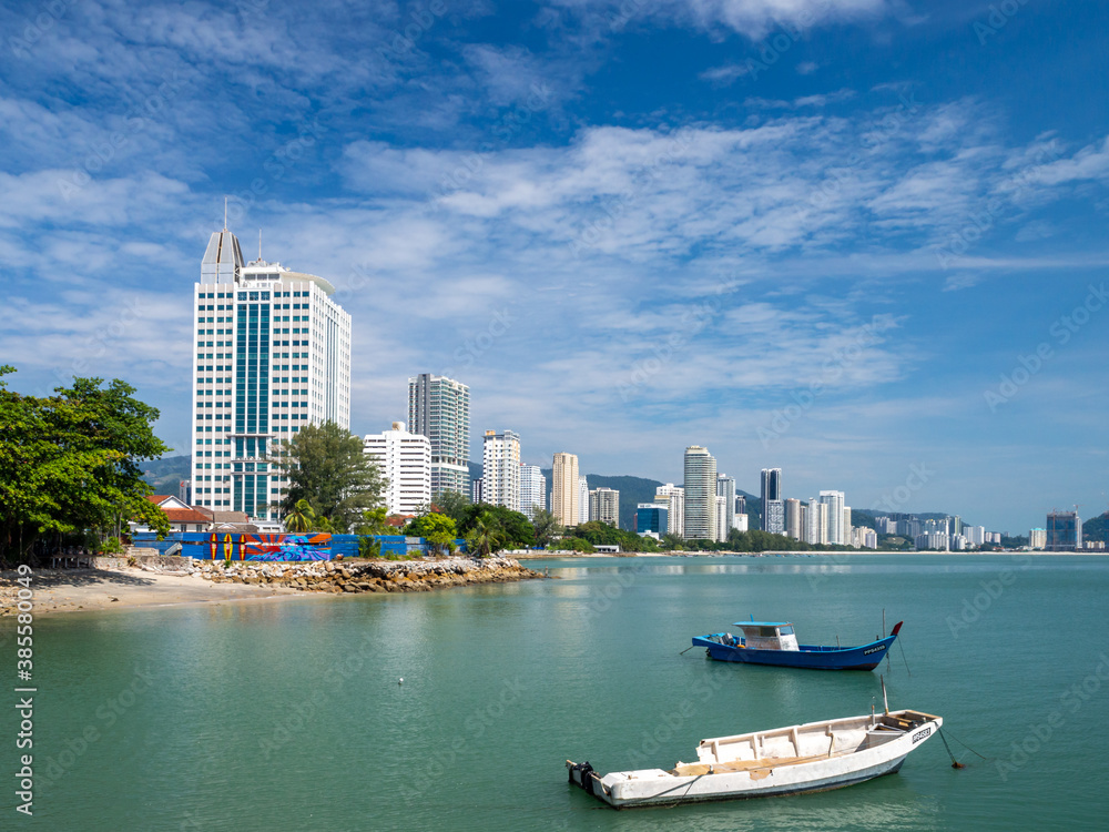 Penang, Malaysia, Georgetown. City panorama at the sea coast promenade ...