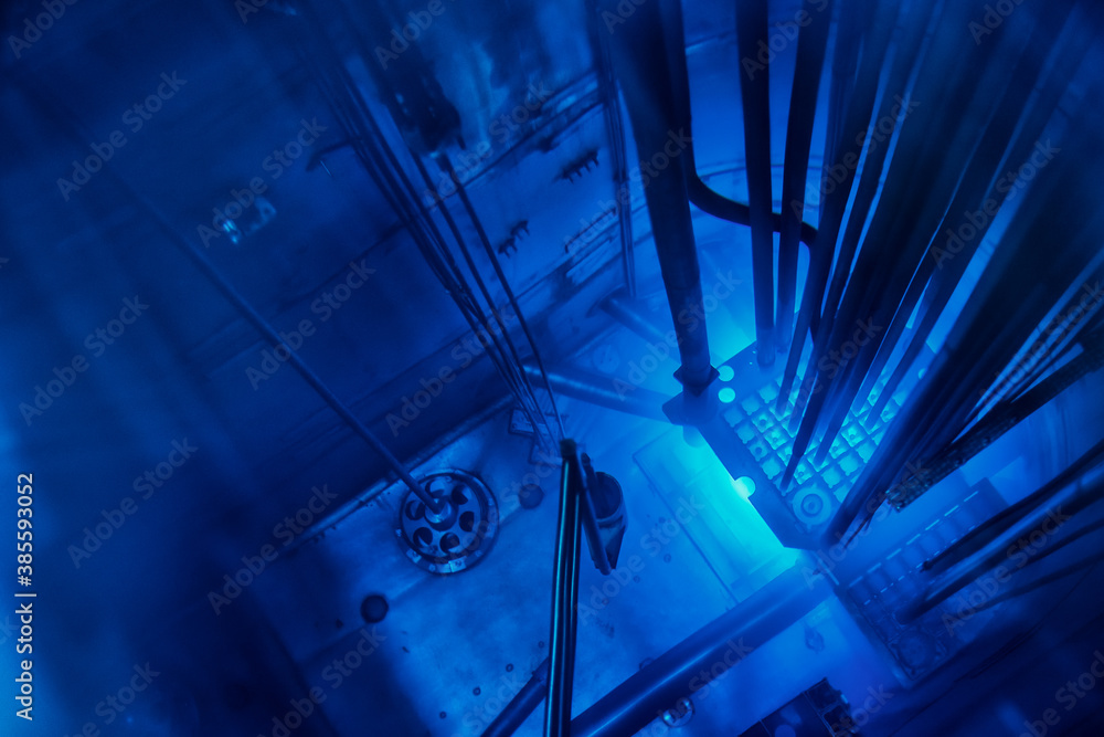 Blue glow water of nuclear reactor core powered, caused by Cherenkov ...