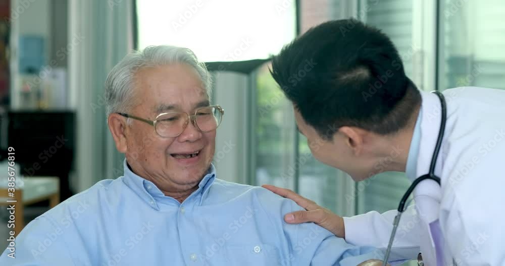 Happy Asian elderly man patient Have fun talking with professional man ...