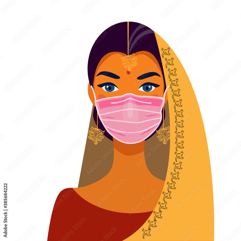 Indian woman in traditional dress and face mask. Portrait of a ...