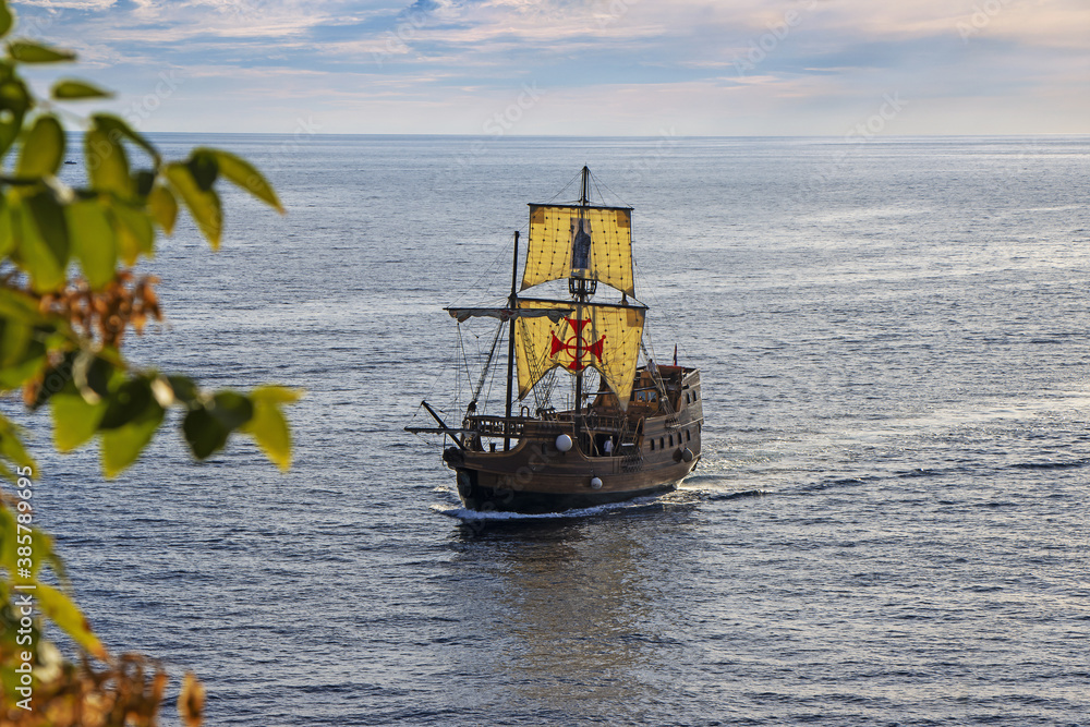 Tirena, Tourist replica of Wooden Medieval ship sailing to old port in ...