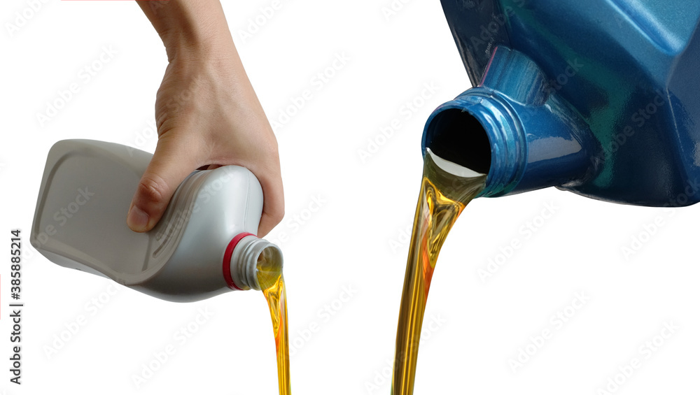Refueling and pouring oil quality into the engine motor car ...