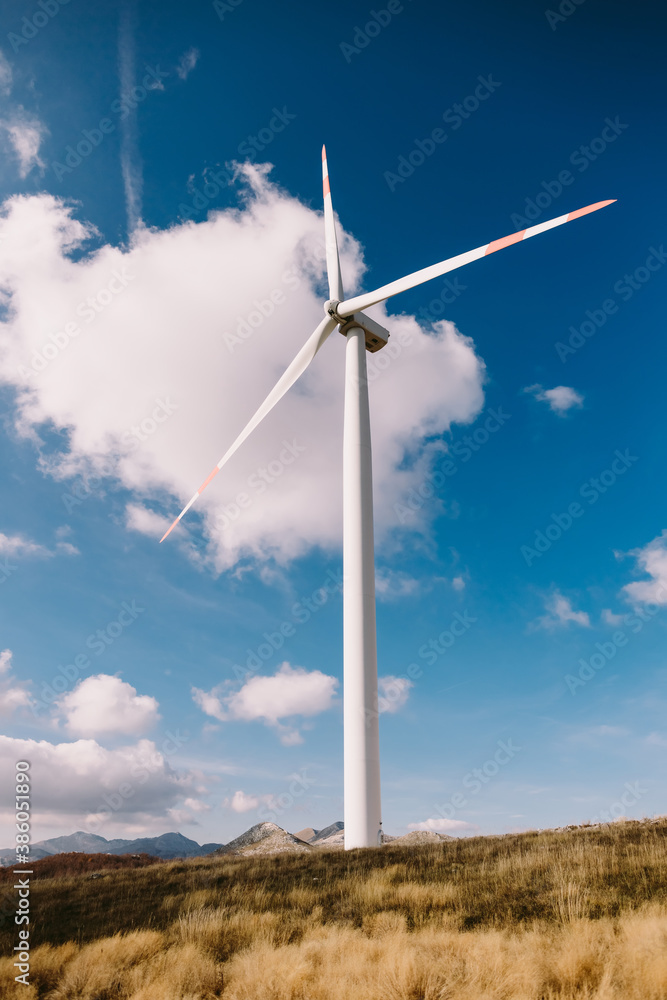 windmill energy turbine. Wind power station with a group of wind ...