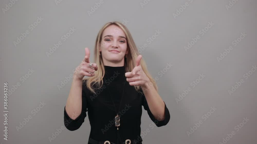 Hands pistol, cheeky bright fashion portrait of crazy funny imitating ...