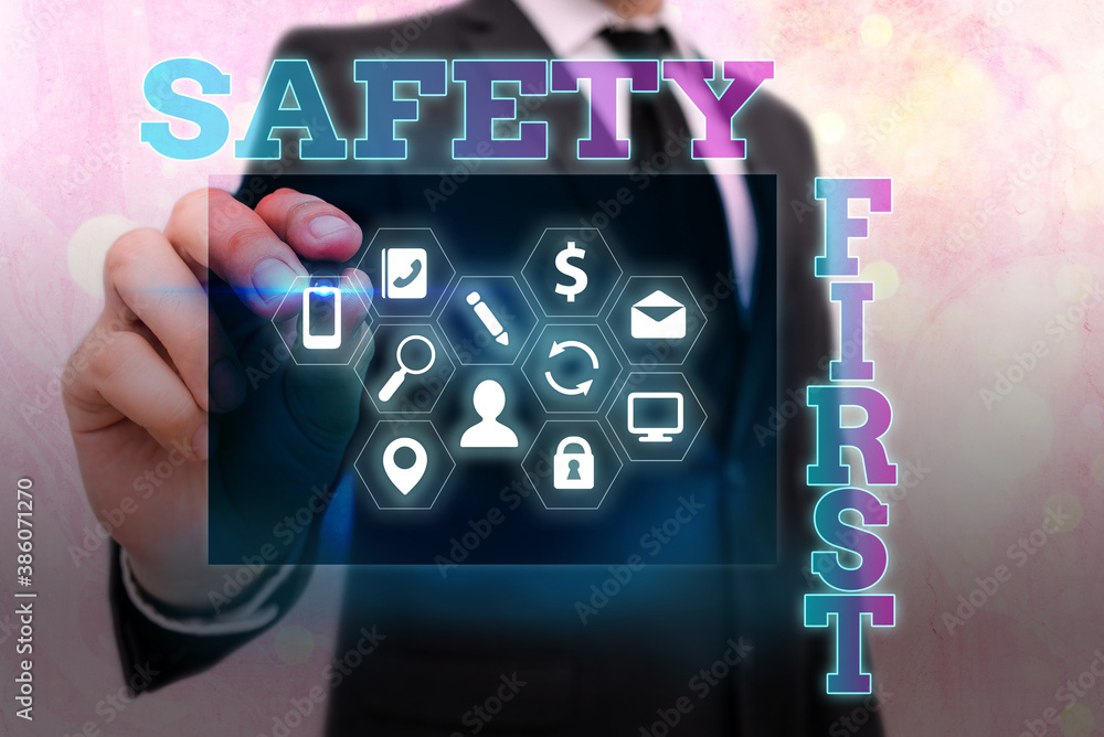 Writing note showing Safety First. Business concept for Avoid any ...
