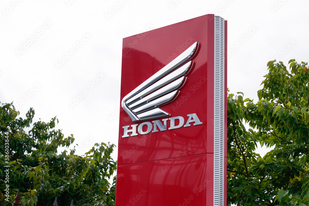 honda motorcycle text and sign front of dealership store motorbike ...