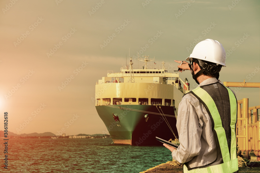 Engineer working at a port and point the target for business of ...