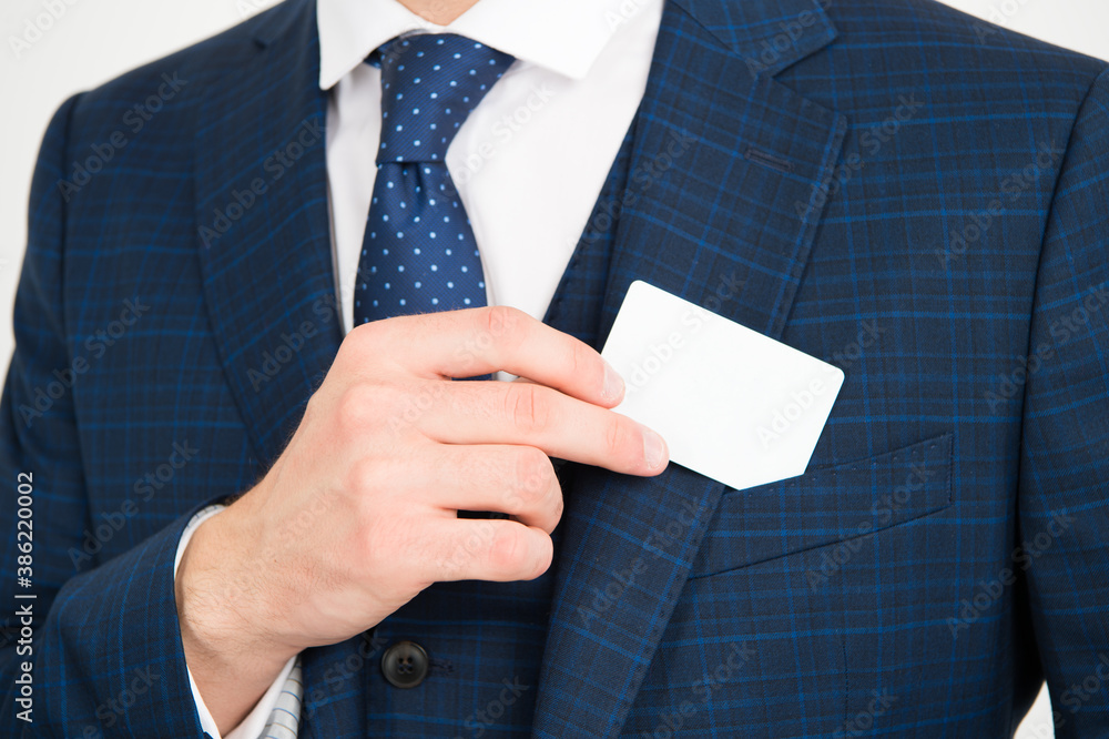 Showing his visiting card. Male hand take card out of suit pocket ...