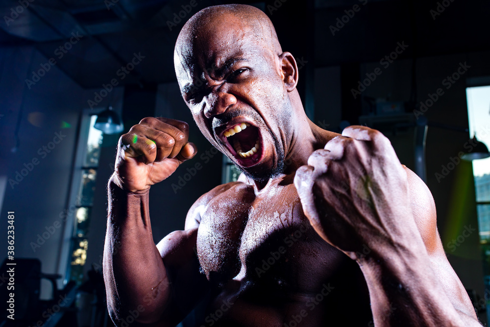 handsome shirtless latino american athlete male fight screaming in gym ...