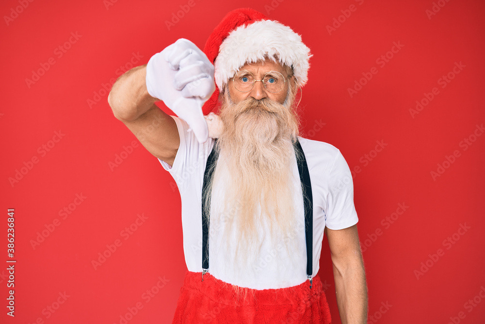Old senior man with grey hair and long beard wearing white t-shirt and ...