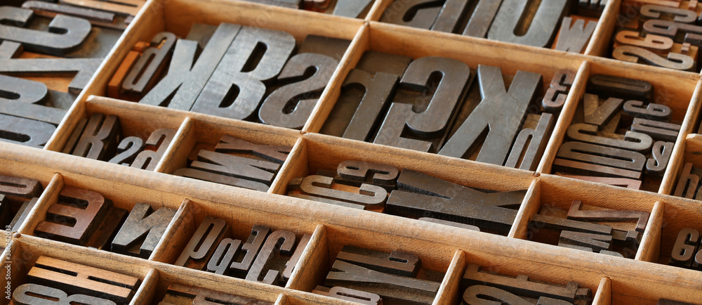 Old letterpess background. Collection of vintage block letters made of ...