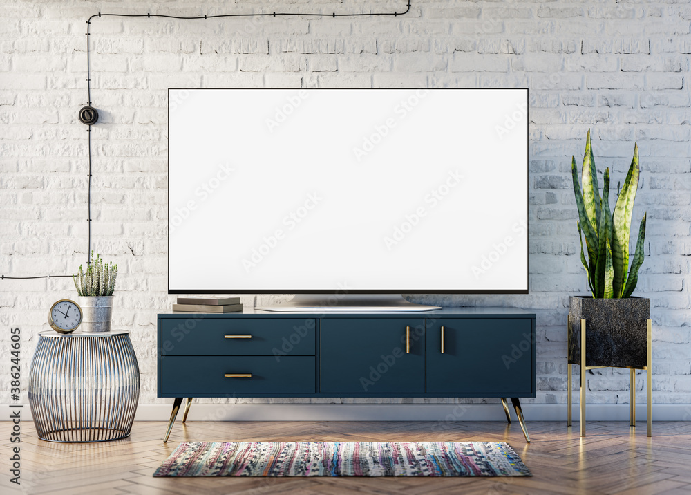 Smart TV blank screen in loft interior with a brick wall, a stylish ...