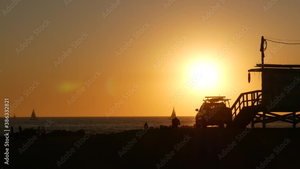 Summertime travel concept. Dark silhouette, iconic retro wooden ...