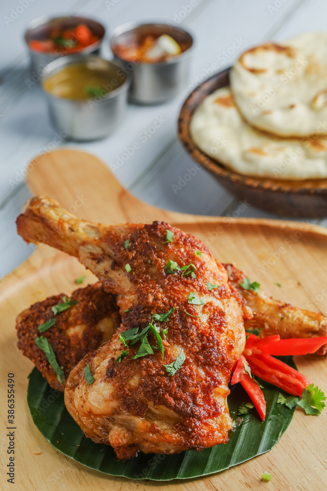 Tandoori Chicken. Indian barbecue chicken. Indian chicken dish prepared ...