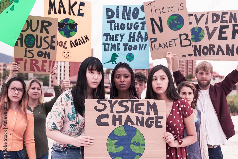 People protesting against multicultural opinion. Young people from ...