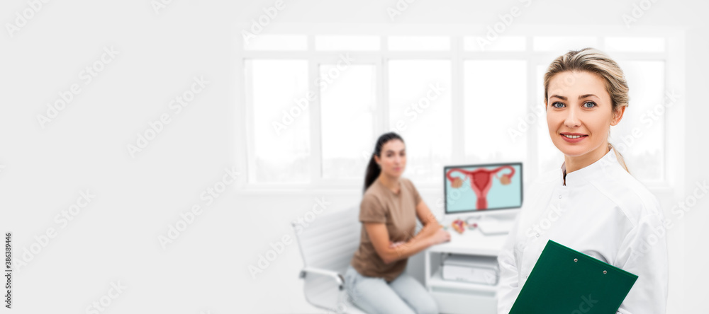 Portrait gynecologist during a consultation for young woman patient ...