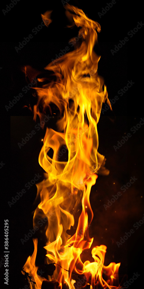 Realistic fire Stock Image In Black Background Stock Photo | Adobe Stock