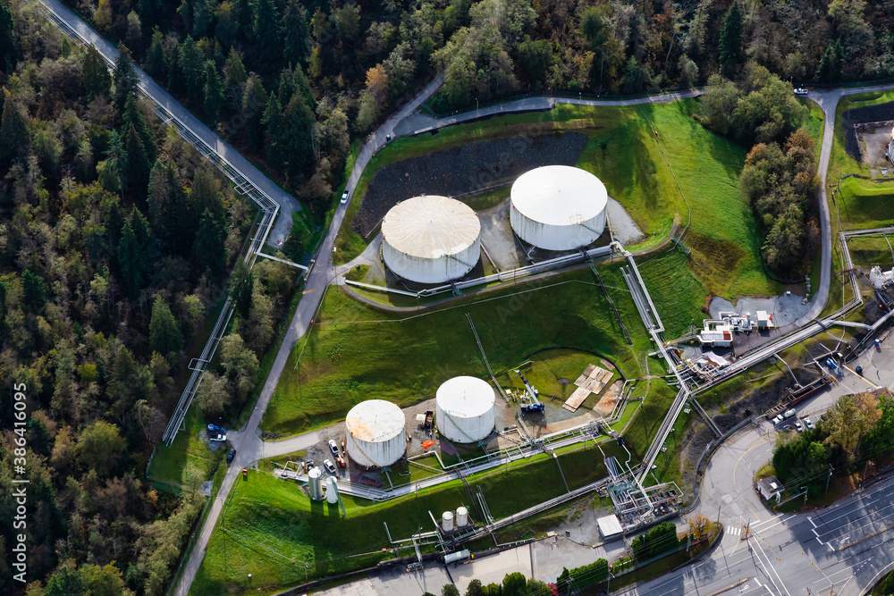 Aerial view of Oil Refinery Industrial Site in a modern city. White ...