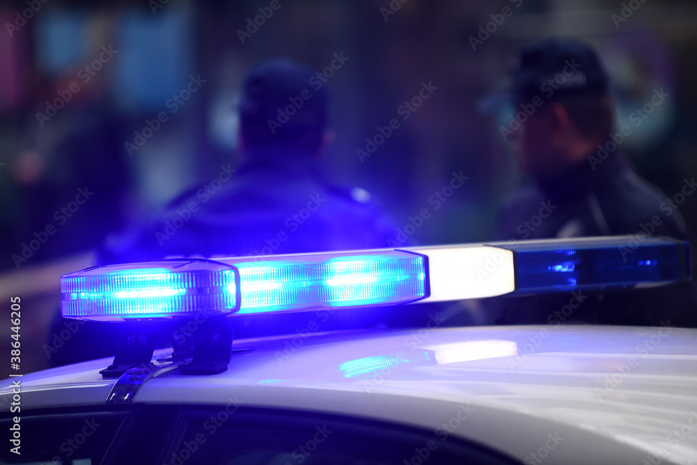 Blue light on a police car Stock Photo | Adobe Stock