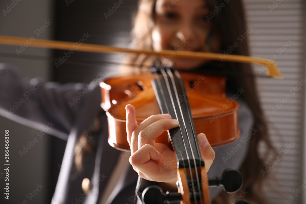 Preteen girl playing violin at music lesson, closeup Stock Photo ...