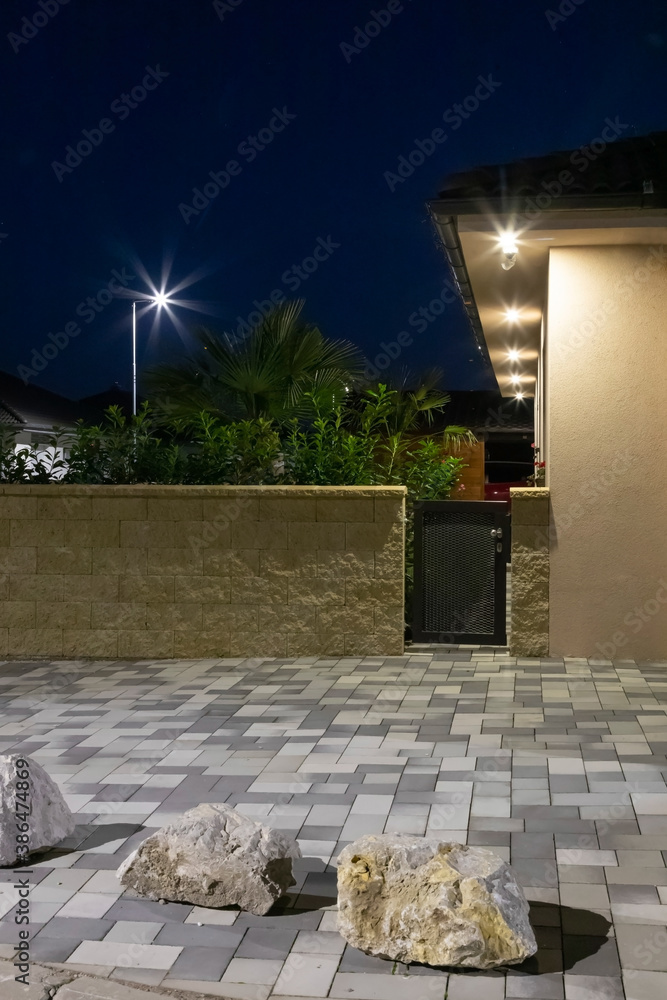 residential area with modern outdoor lighting and interlocking paving ...