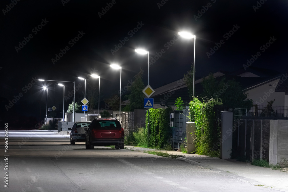 quiet night street with modern LED streetlights Stock Photo | Adobe Stock