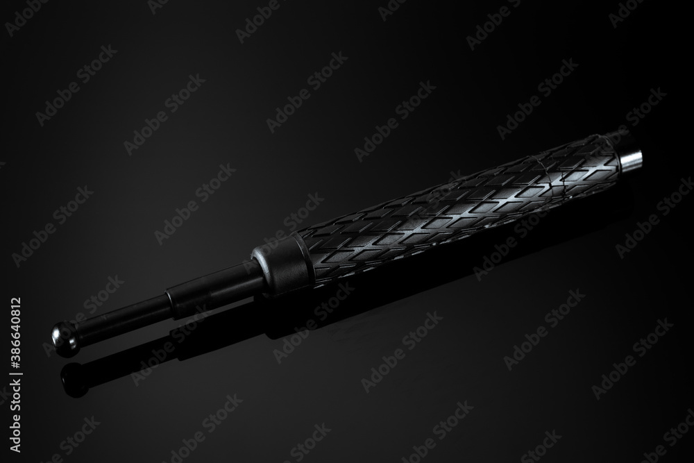 Foldable telescopic baton on a gradient background Stock Photo | Adobe ...