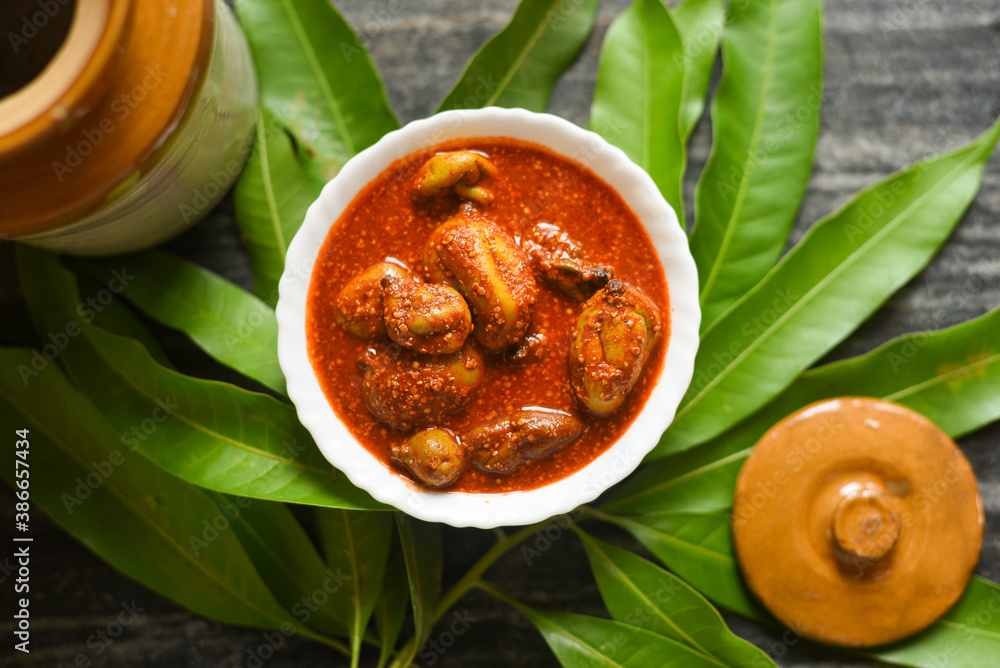 Indian Traditional Raw Mango Pickle. red spicy hot tender mango pickle ...