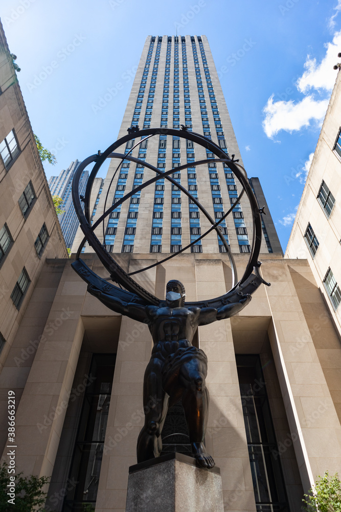 Atlas Statue at Rockefeller Center Wearing a Mask during the Covid 19 ...