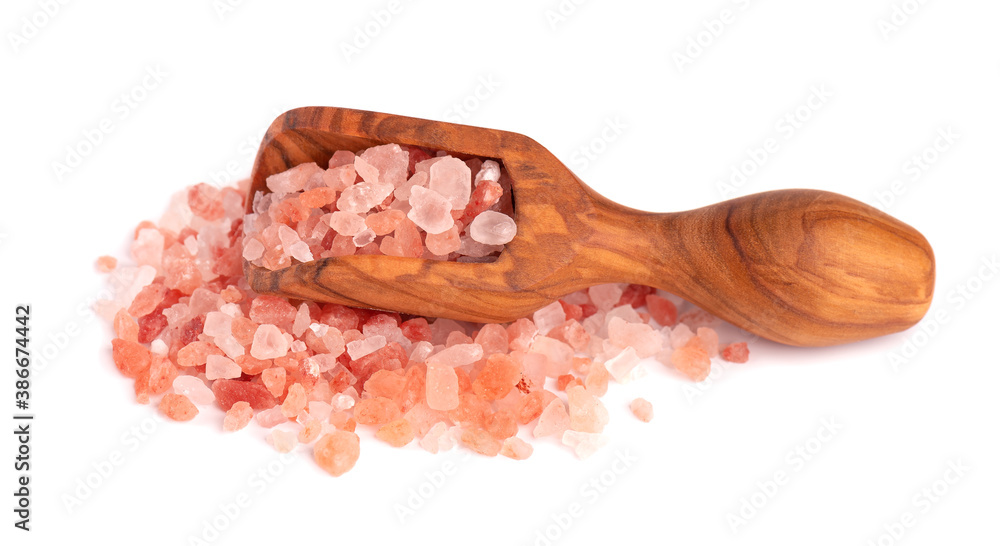 Himalayan pink salt in wooden scoop, isolated on white background ...