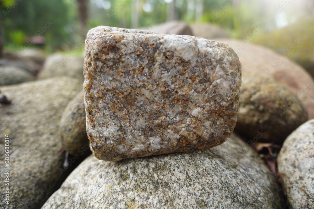 Granite rock on nature background. Granite is a light-colored igneous ...