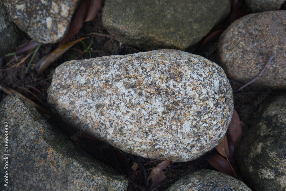 Granite rock on nature background. Granite is a light-colored igneous ...