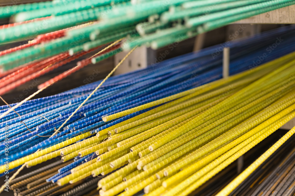 Fiberglass reinforcement. Fiberglass rods with a ribbed surface of a ...