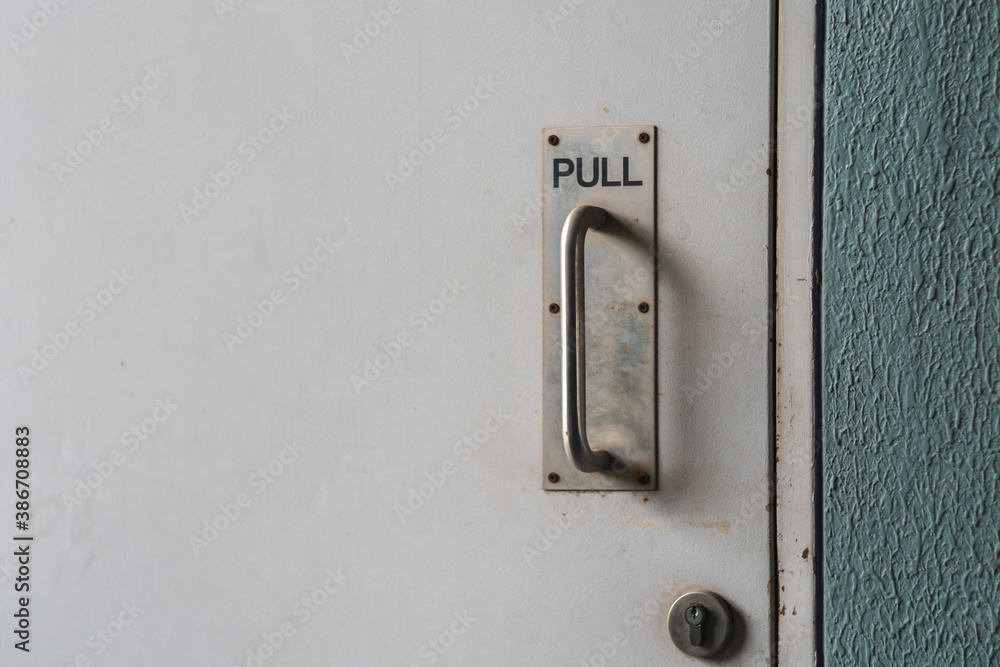 sign "Pull" at a door with handle, Stock Photo | Adobe Stock