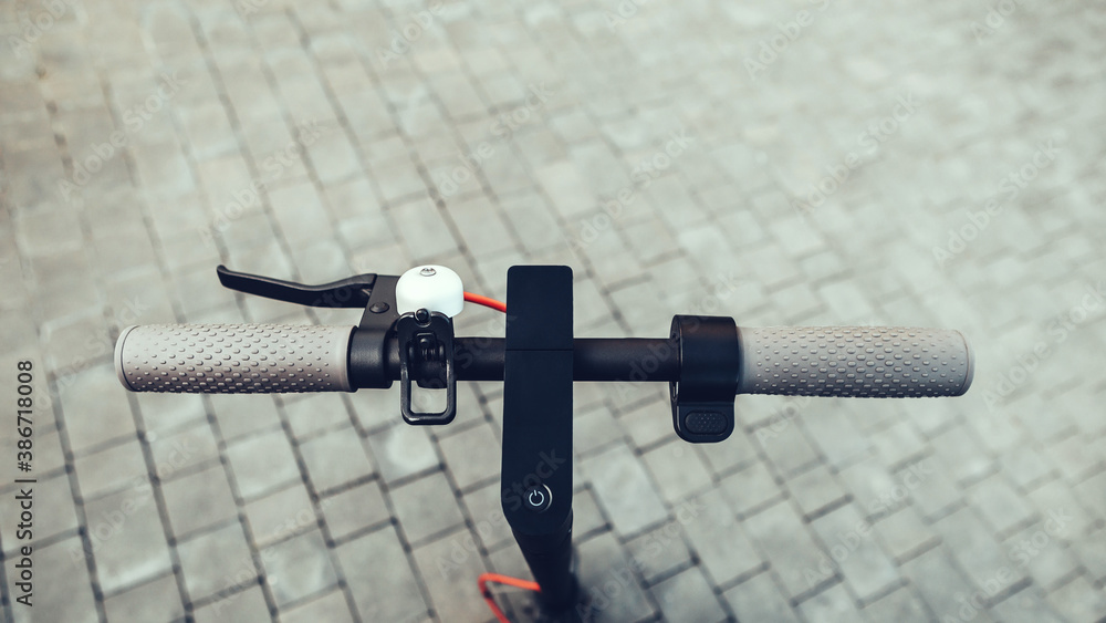 Top view of an electric scooter, kick scooter or e-scooter handlebar ...