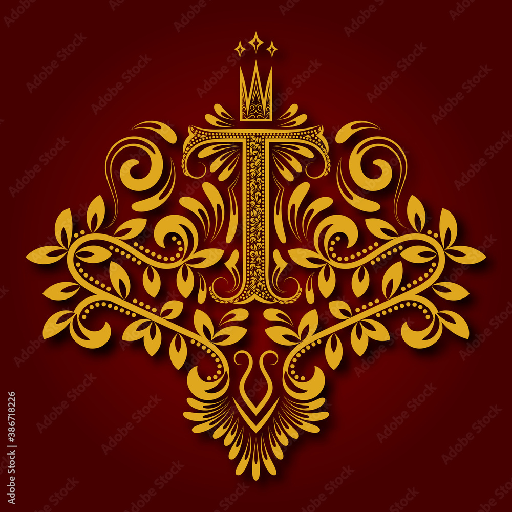 Letter T heraldic monogram in coats of arms form. Vintage golden logo ...