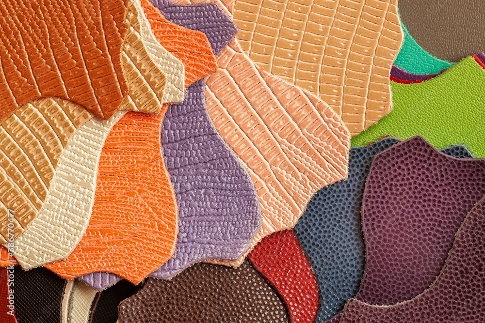 Variety of leather samples of different textures and colors, top view ...