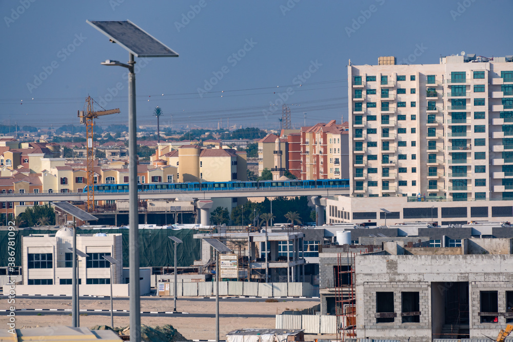 cityscape from a new part of the city of Dubai, UAE with residential ...