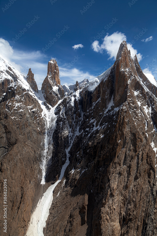 vertical landscape of snow mountain sand trango towers in Karakorum ...