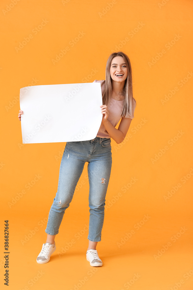 Young woman with blank paper sheet on color background Stock Photo ...