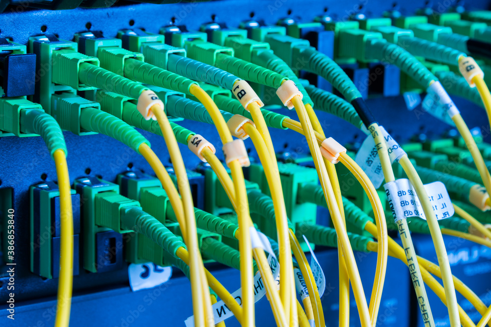 fiber optic cables connected into main data switch Stock Photo | Adobe ...