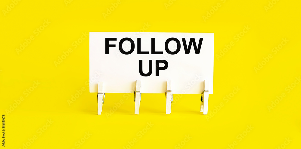 Follow up, message on white card on yellow background Stock Photo ...