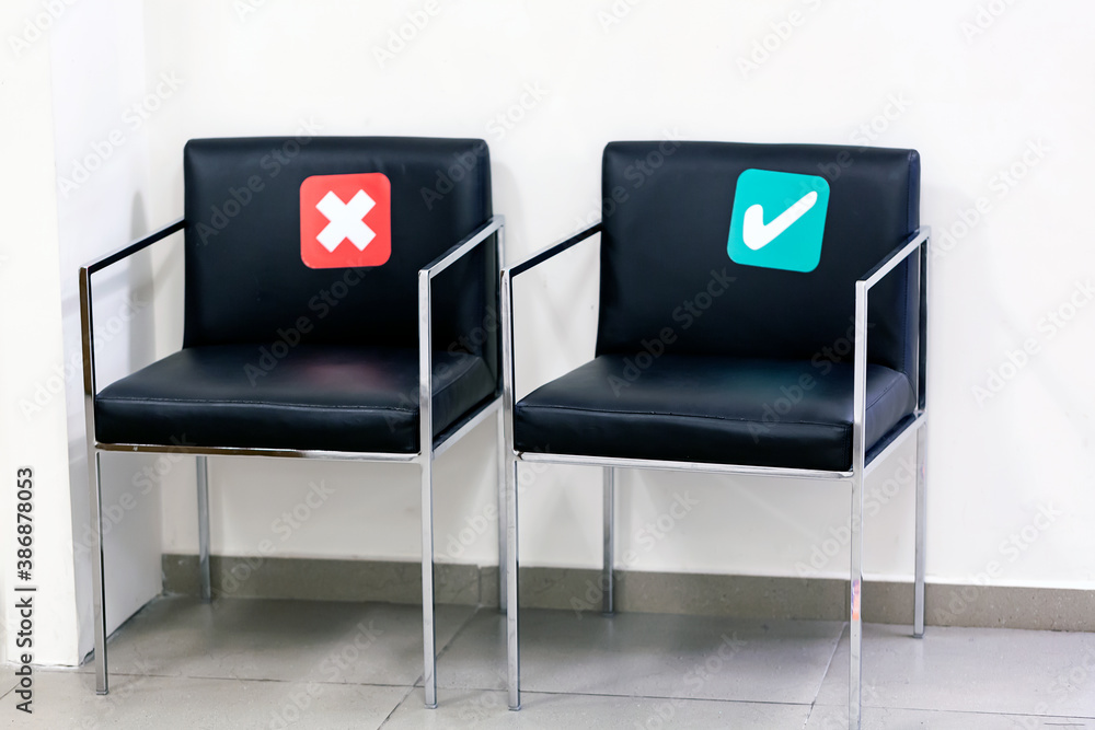 Waiting room couch in a hospital with COVID-19 social distance and ...