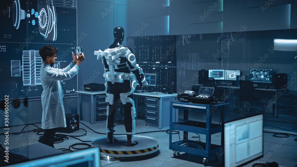 In Robotics Development Laboratory: Engineer Uses Digital Tablet ...