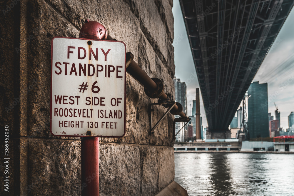 FDNY Sign with red Standpipe west side of Roosevelt Island under the ...