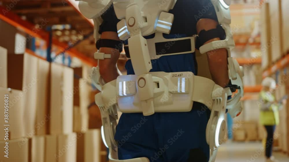 High-Tech Futuristic Warehouse: Worker Wearing Advanced Full Body ...