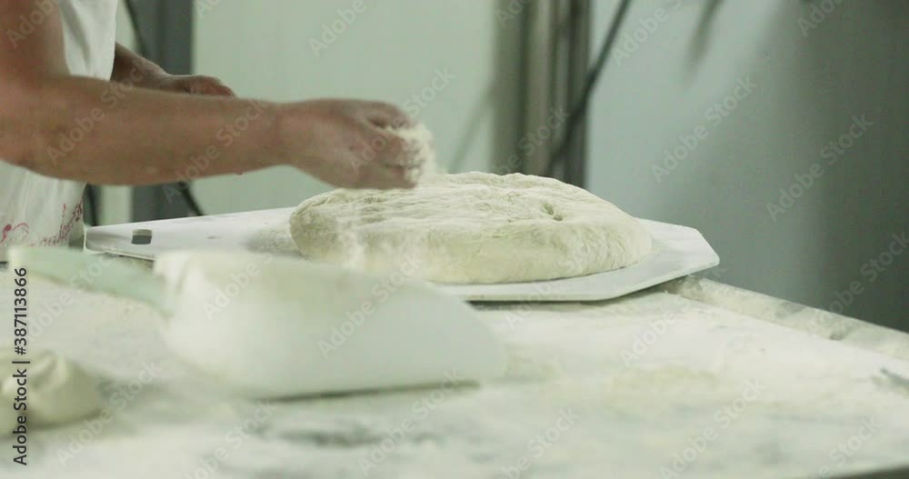 Baker Put And Flatten The Kneaded Dough On The Divider Plate And ...