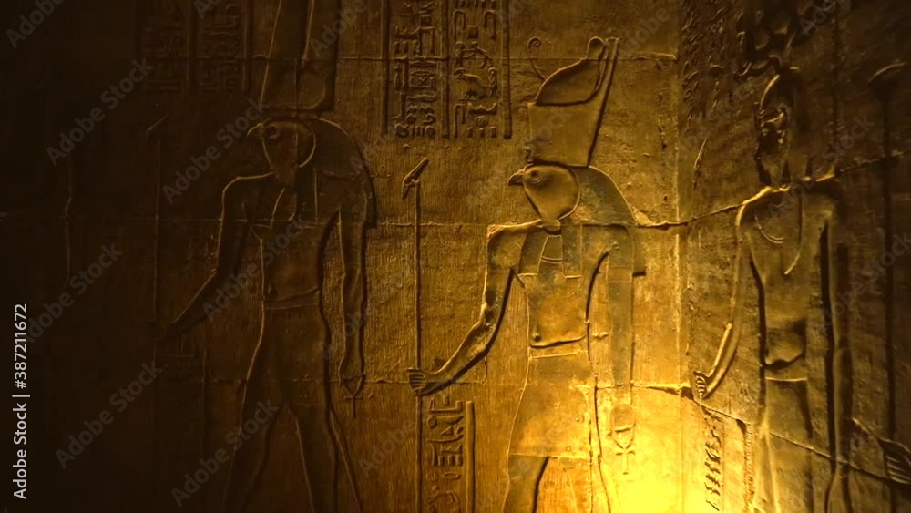 Egyptian-patterned and illuminated tunnels of the Edfu Temple near the ...