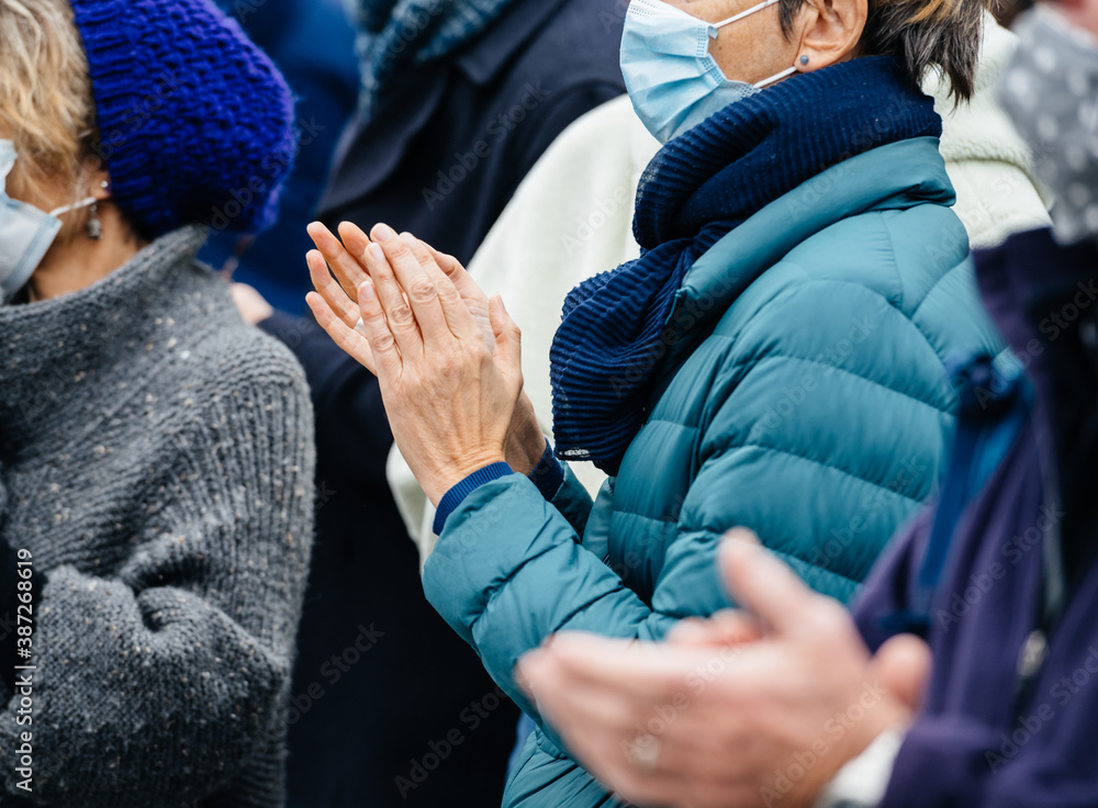 Unrecognizable people gathered at the Place Kleber to pay tribute ...