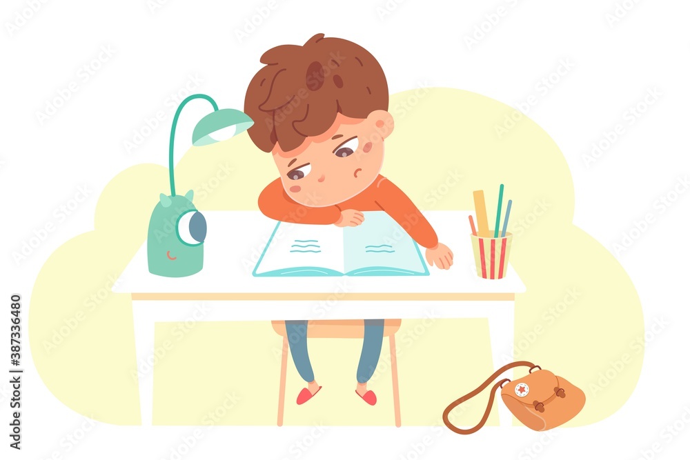 Sad boy doing homework at home. Tired schoolboy learns lessons, sits at ...